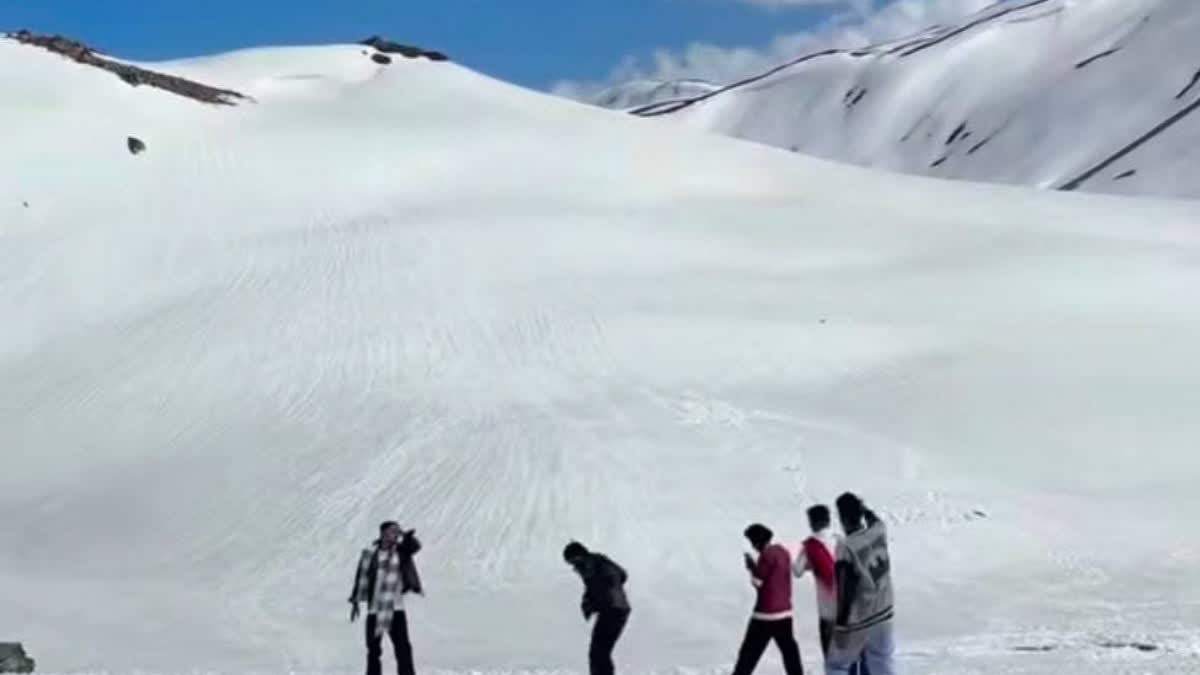 From Scorching Plains To Icy Peaks: Tourists Celebrate Snow At Rohtang Pass