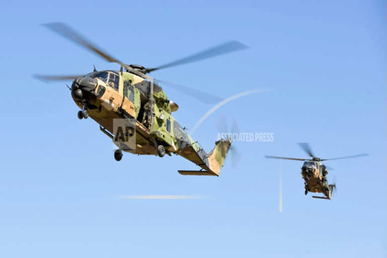 4 crew members missing after Australian army helicopter ditched off ...